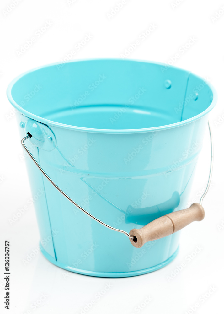 Light blue iron/metal bucket/pail/container with handle isolated on ...