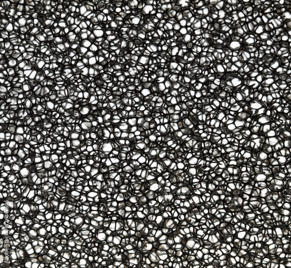 Black open cell foam rubber macro. Thin sheet. Stock Photo | Adobe Stock