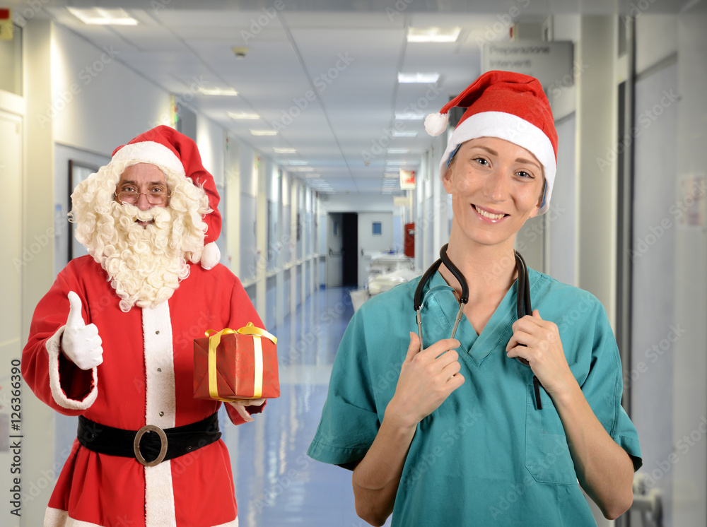 Santa Claus and woman doctor in hospital Stock Photo | Adobe Stock