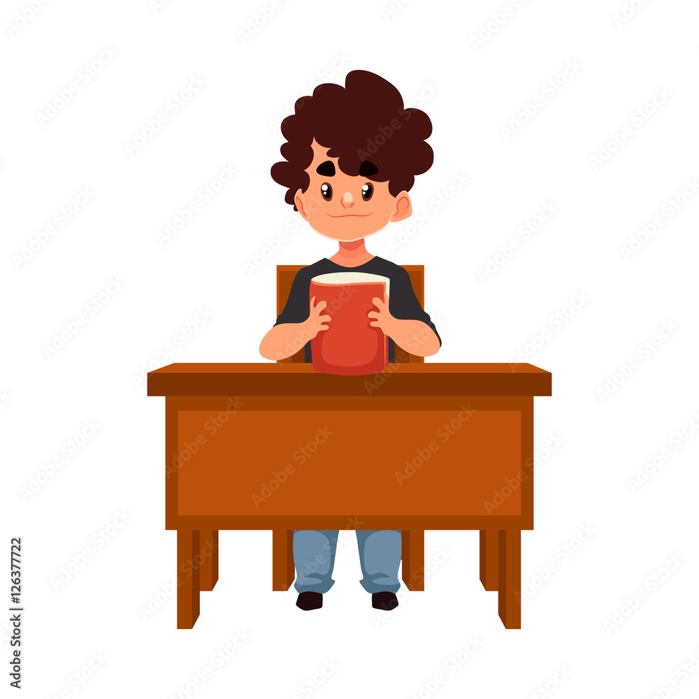 Clever school boy sitting at the desk and holding a book, cartoon style ...