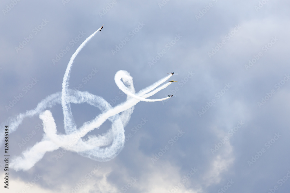 air show, small planes allowed smoke in the air showing the air ...