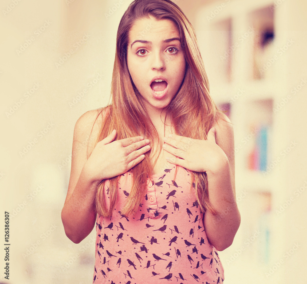 young pretty woman surprised on white background Stock Photo | Adobe Stock