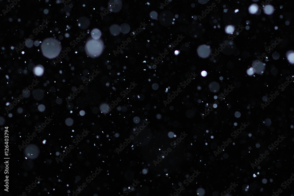 Real falling snow on a black background for use as a texture layer in ...