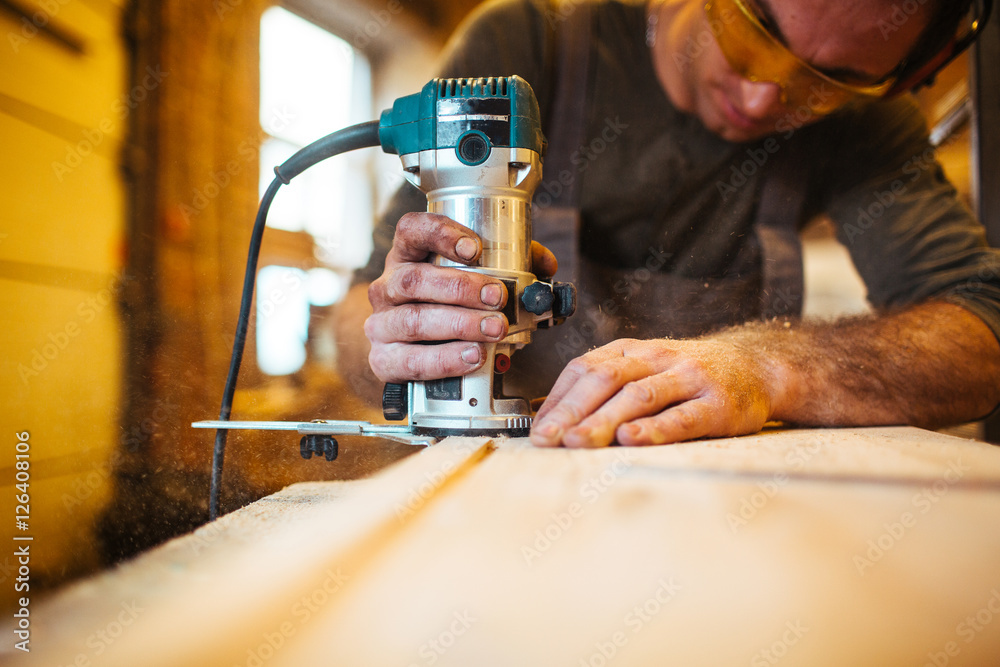 Working with power tool Stock-Foto | Adobe Stock