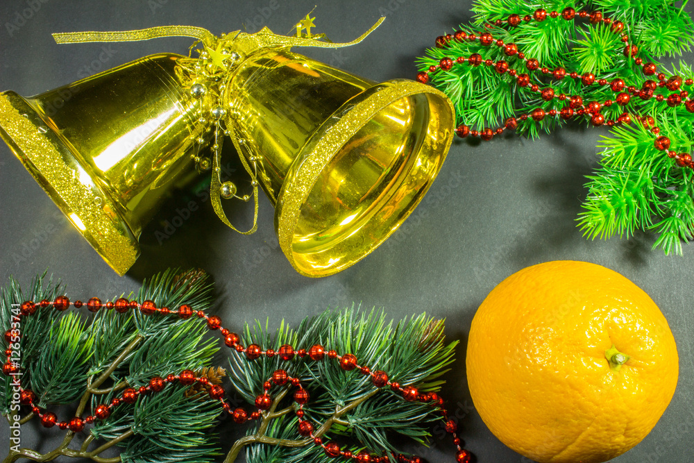 Christmas border design on the dark background.Spruce branches, oranges ...