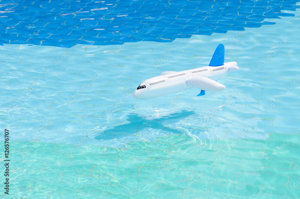 Inflatable airplane in swimming pool Stock Photo | Adobe Stock