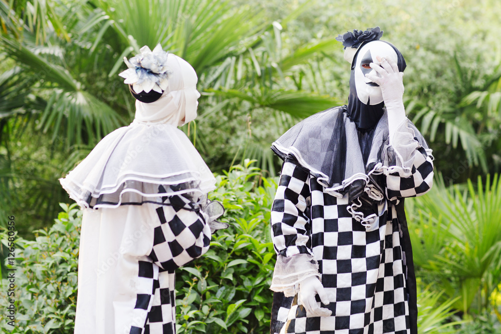 Carnival costume puppet character. Two men dressed in a suit with a ...