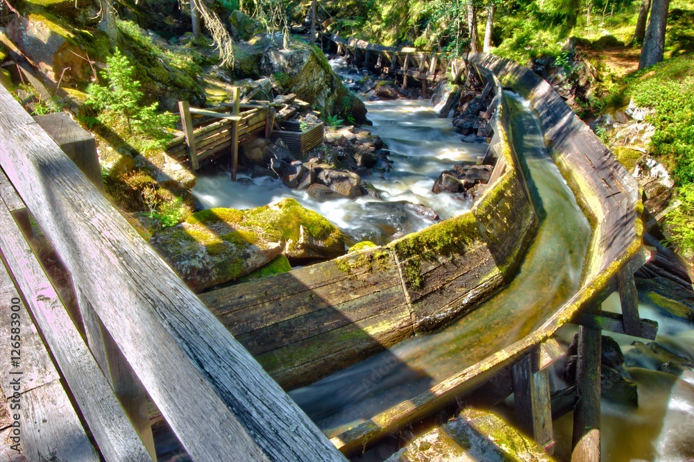 Old timber rafting facility in the Swedish woods Stock Photo | Adobe Stock