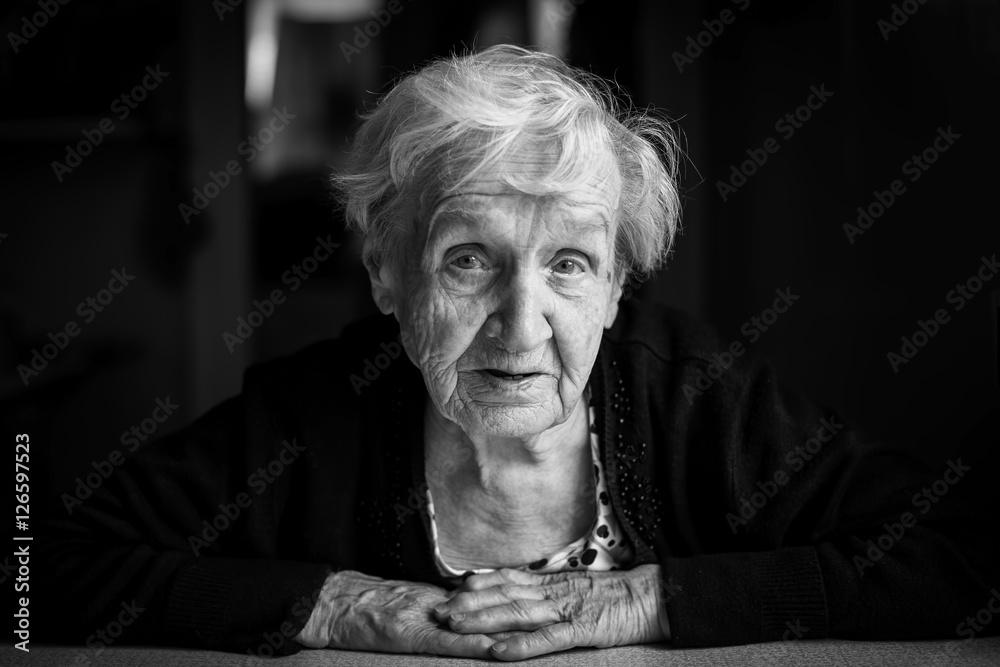 An elderly woman. Grandma, black-and-white close-up portrait. Stock ...