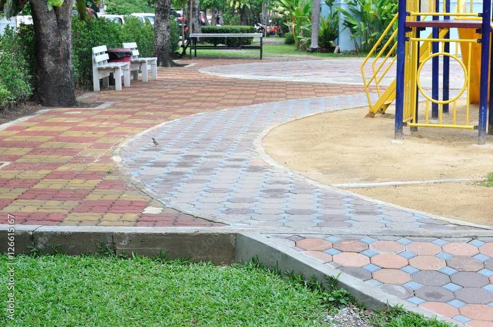 Worm blocks for walkway and green yard. Stock Photo | Adobe Stock