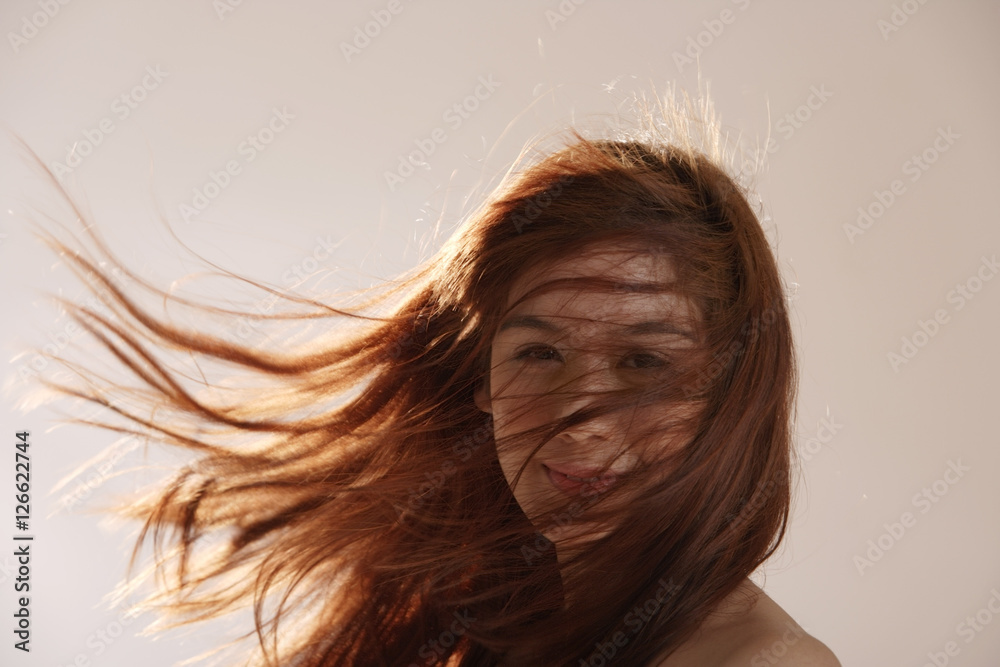 Girl With Hair Blowing In The Wind