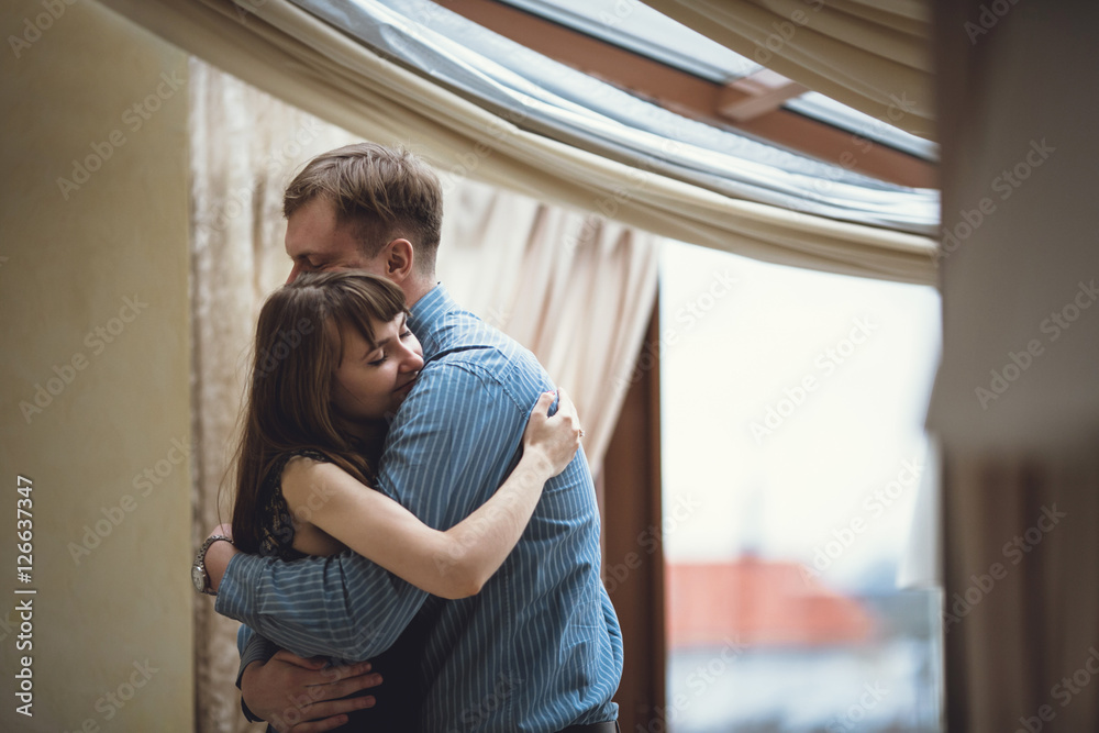 boyfriend hugging his happy and beautiful girlfriend Stock Photo ...