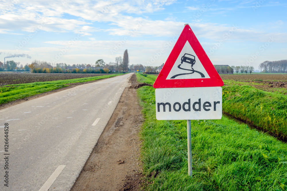 Sign indicating mud in a Dutch agricultural area Stock Photo | Adobe Stock