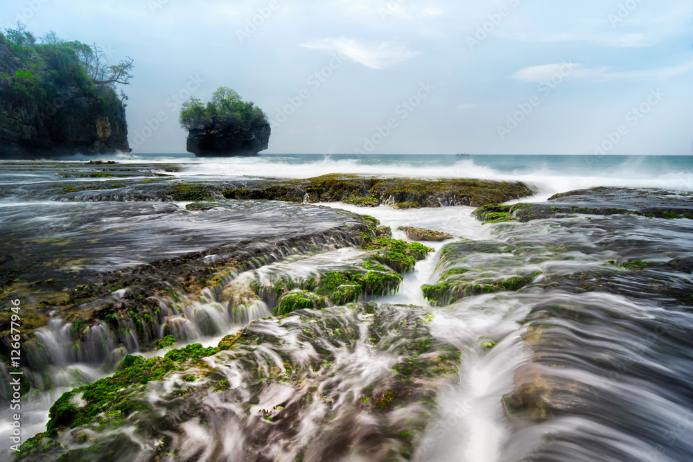 Seascape scenery of beautiful coral formation with sea water flow at ...