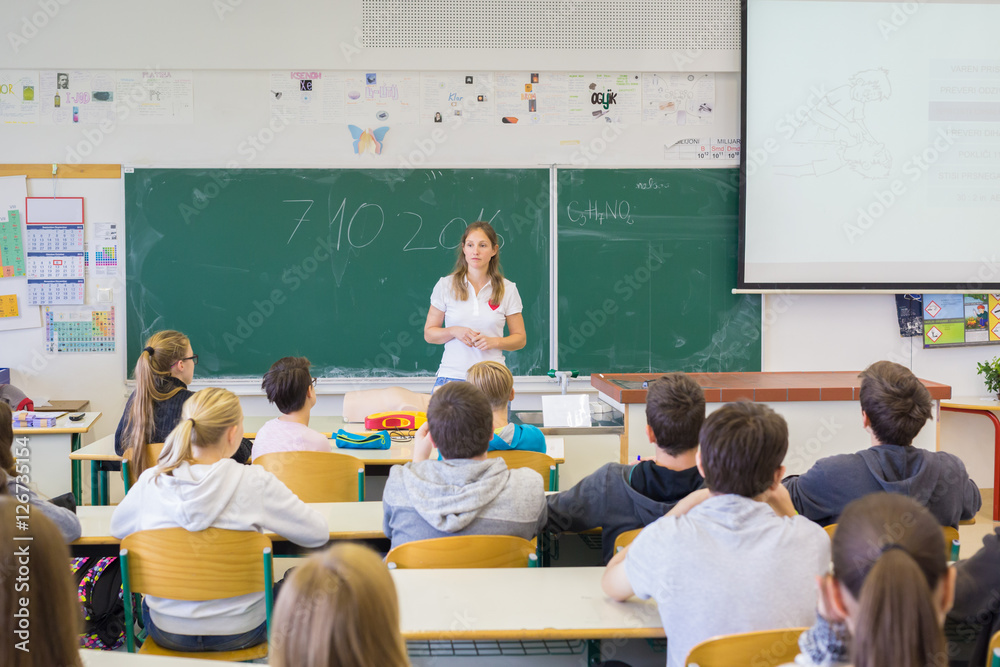 Instructor teaching first aid cardiopulmonary resuscitation course and ...