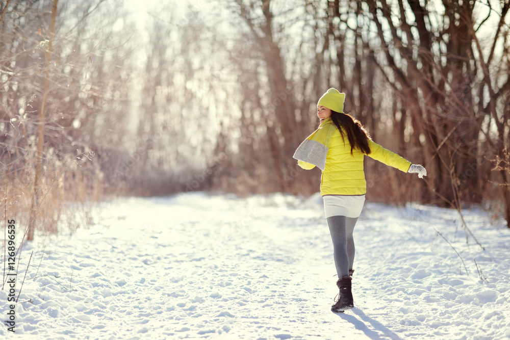 Winter happy woman walking in snow outdoors nature. Joyful young lady ...