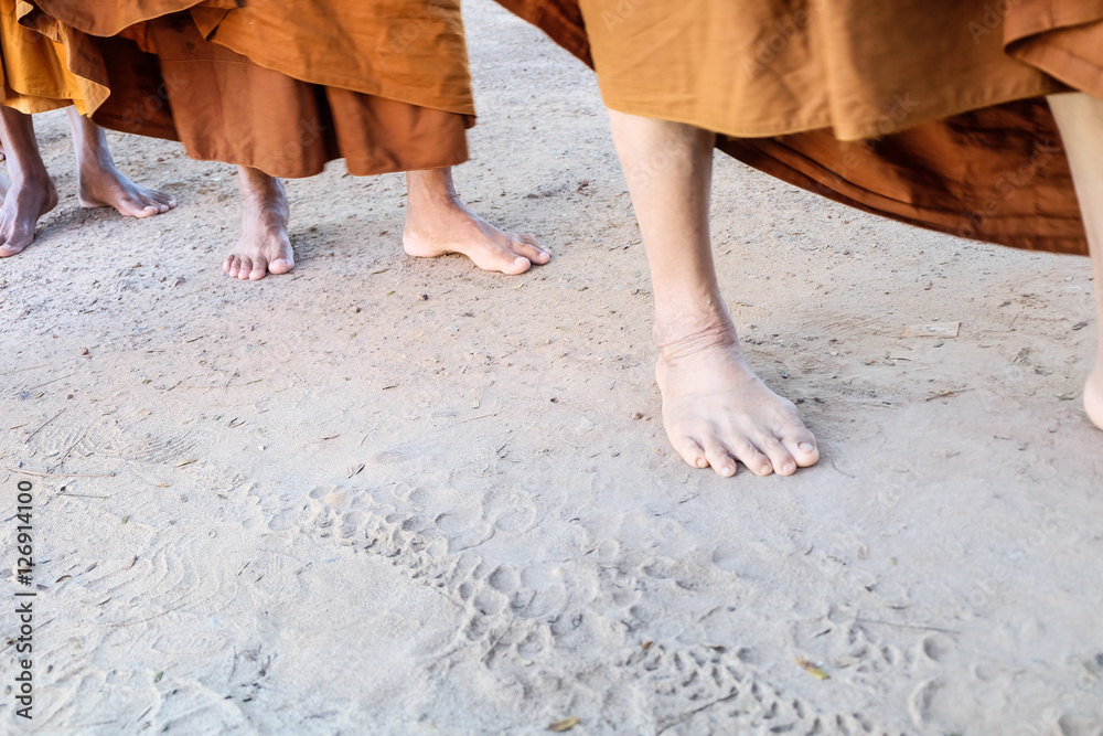 Foto Stock Foot of Monk | Adobe Stock