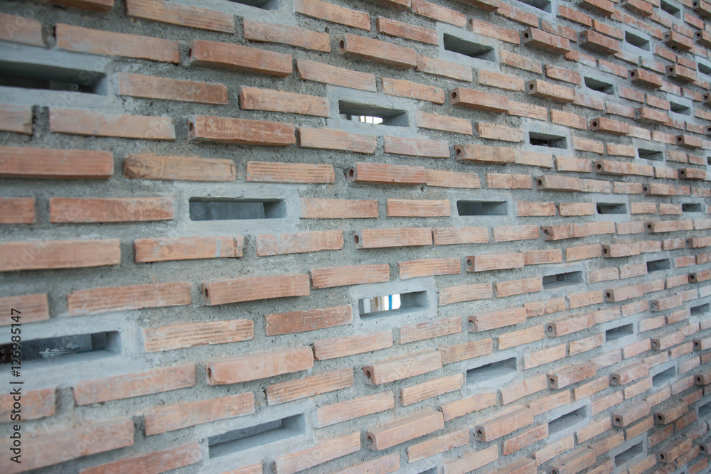 void on red old brick wall background Stock Photo | Adobe Stock