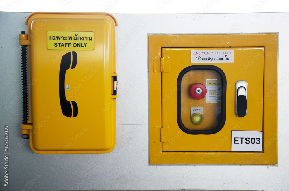 Telephone and emergency stop in control panel Stock Photo | Adobe Stock