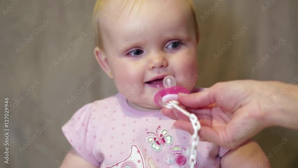 The mother gives her child a pacifier and baby crying Stock Video ...