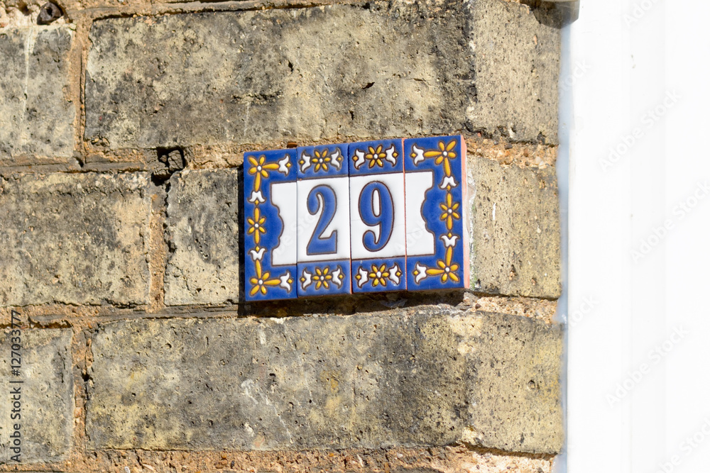 House number 29 sign on wall Stock Photo | Adobe Stock