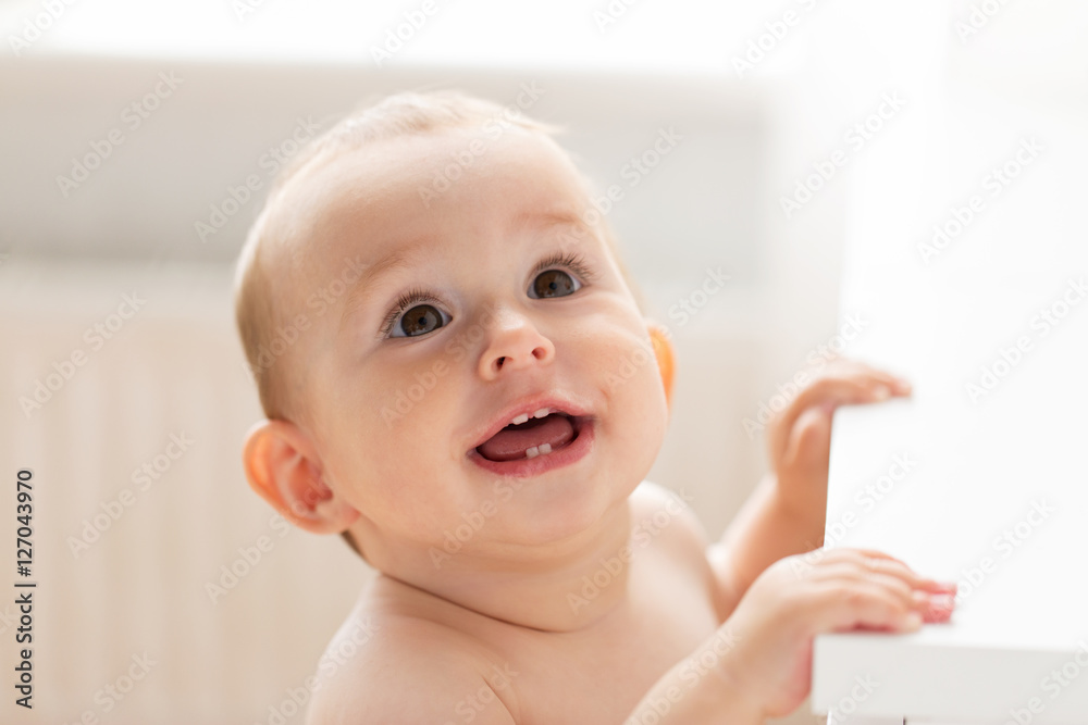 happy little baby boy or girl at home looking up Stock Photo | Adobe Stock