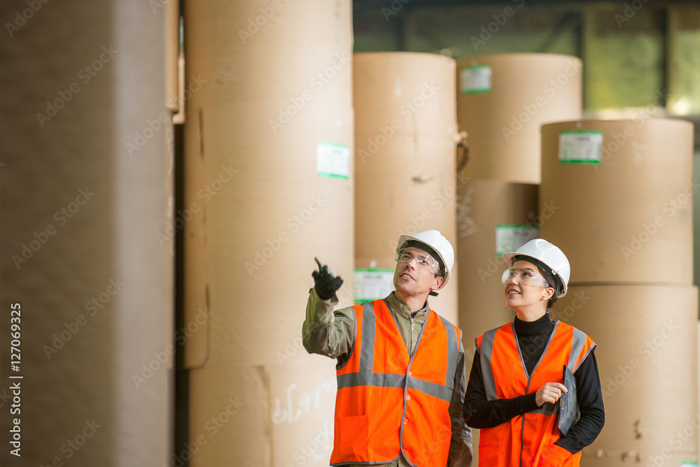 Paper mill factory workers Stock Photo | Adobe Stock