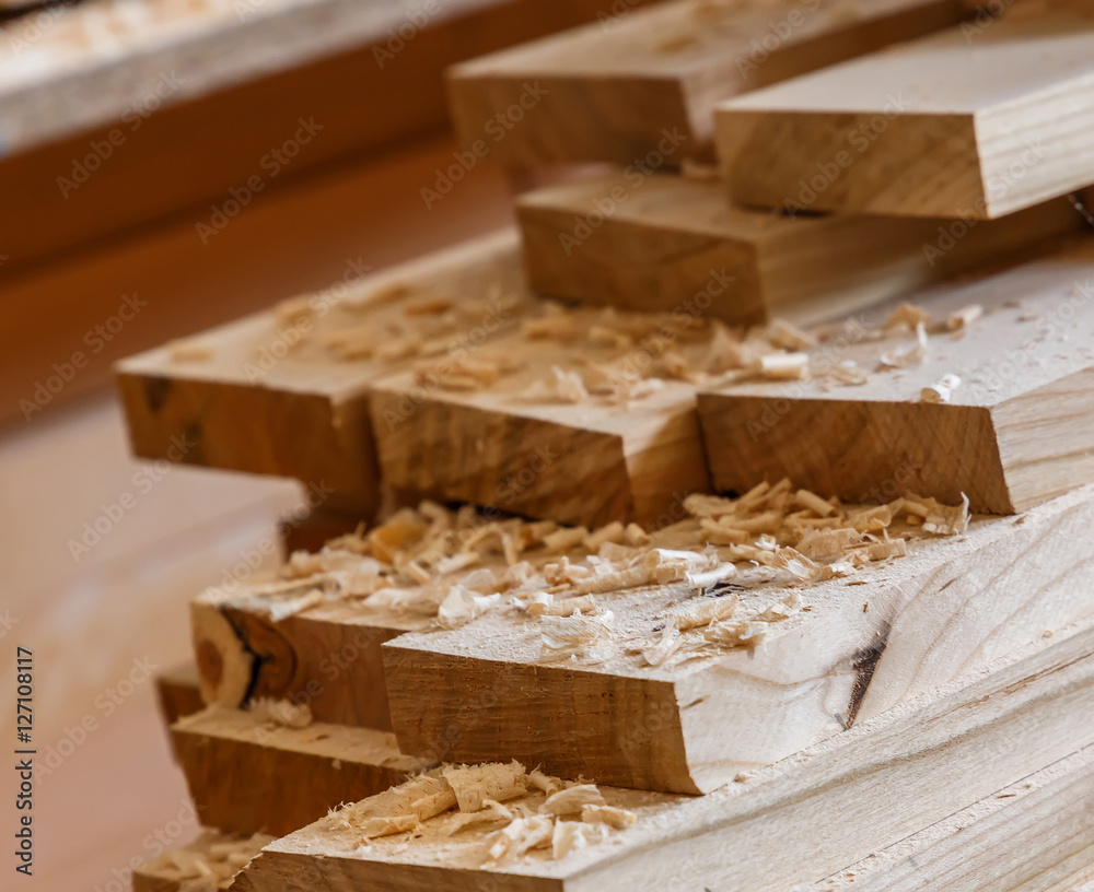 background with planks of wood shavings. wood construction material for ...