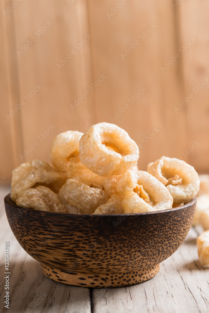Pork rinds also known as chicharon or chicharrones, deep fried p Stock ...