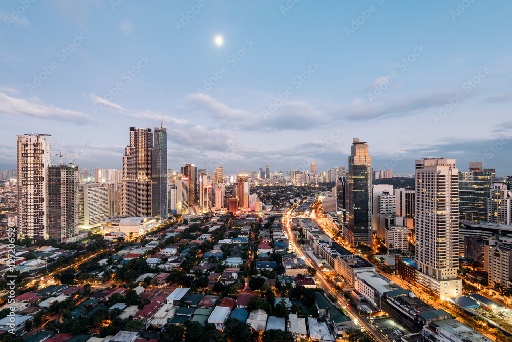 Makati Skyline at night. Makati is a city in the Philippines` Metro ...