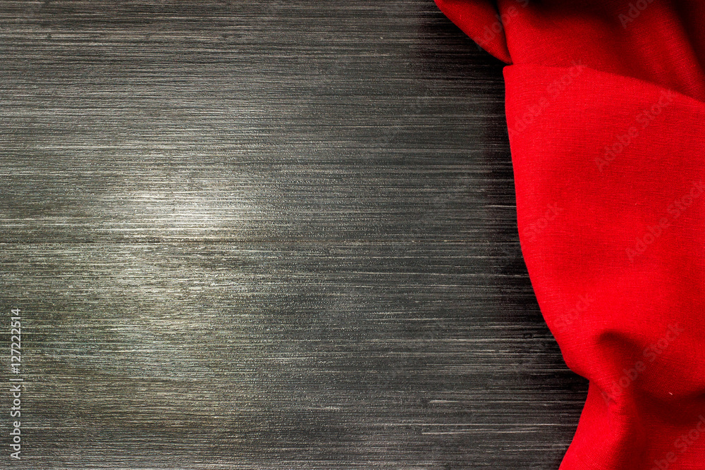 Red tablecloth on wooden table for background. Fabric texture. Wooden ...