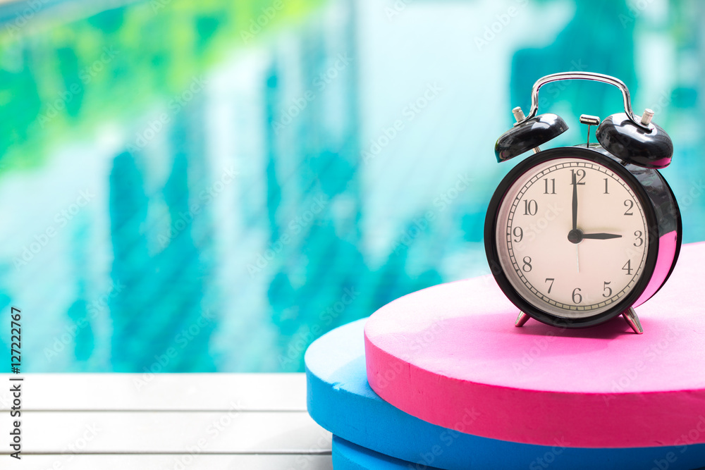 swimming times, retro black bell clock time at 3 o'clock at swimming ...