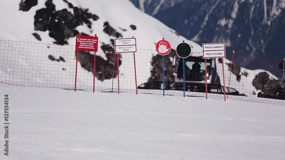 Landscape snowy mountains at ski resort. Rathraks at fence. Nature ...