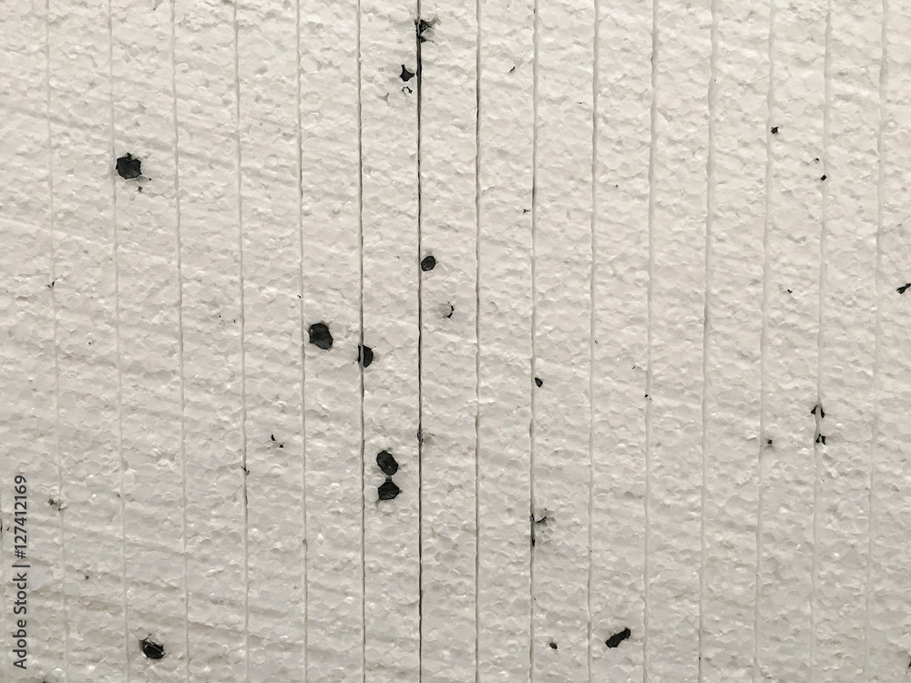 Polystyrene insulation boards background with copyspace and accented ...