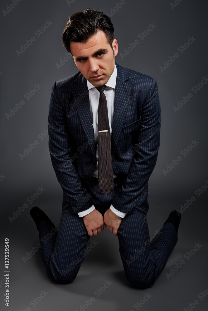 Person Kneeling Down