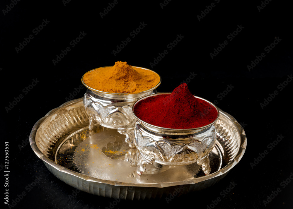Turmeric and kumkum powder Stock Photo | Adobe Stock