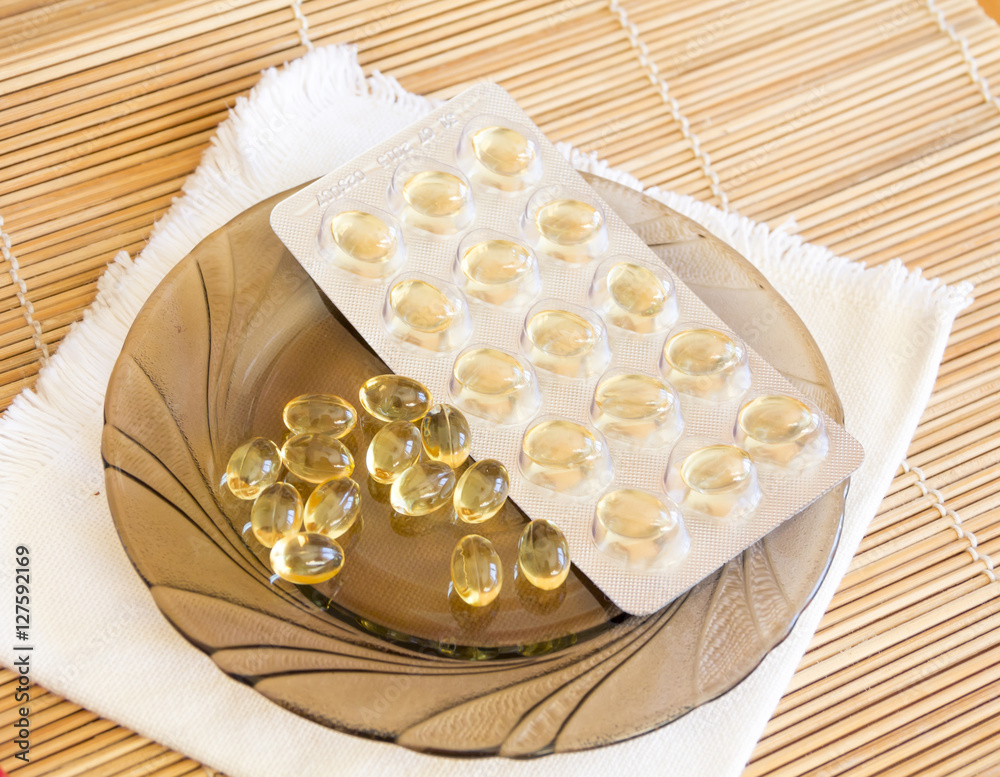 rosehip oil capsules Stock Photo | Adobe Stock