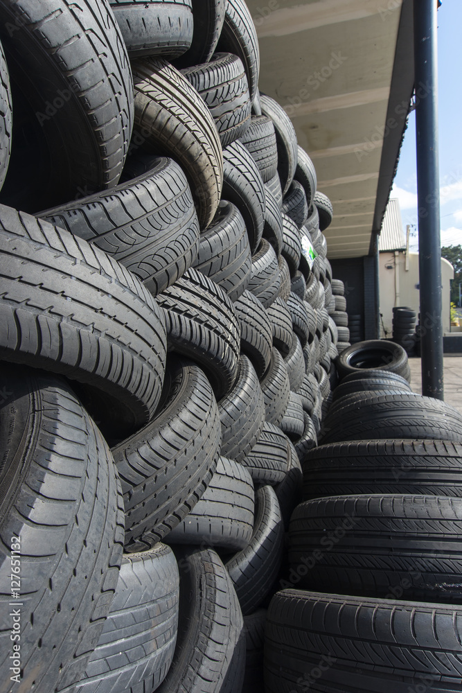 Tyres Stacked Recycling perspective. Stock Photo | Adobe Stock