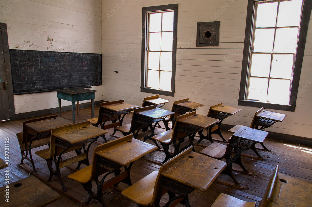 Old school house room with desks Stock Photo | Adobe Stock