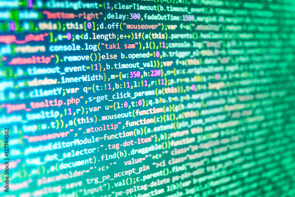 Programming code on computer screen. Software source code. Notebook ...