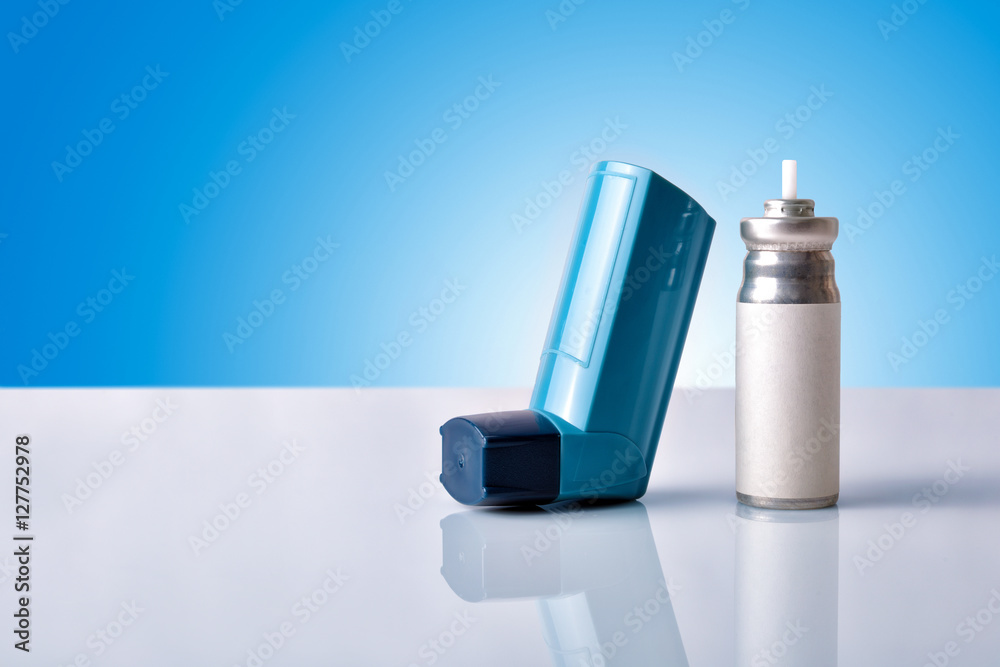 Cartridge and blue medicine inhaler with blue background front v Stock ...