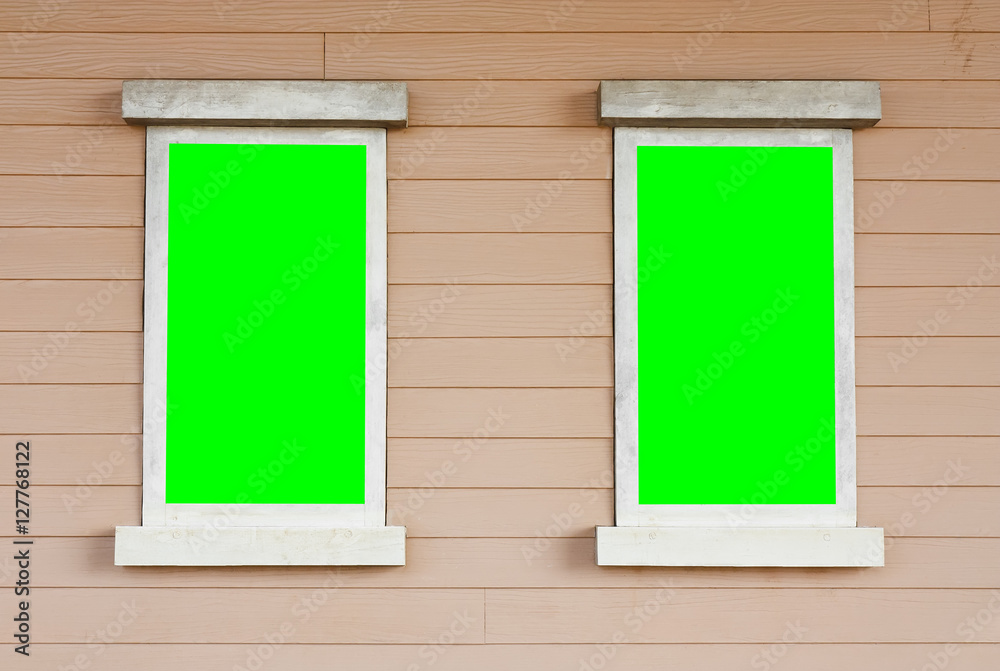 dual or two old wood white window with big green screen on the w Stock ...