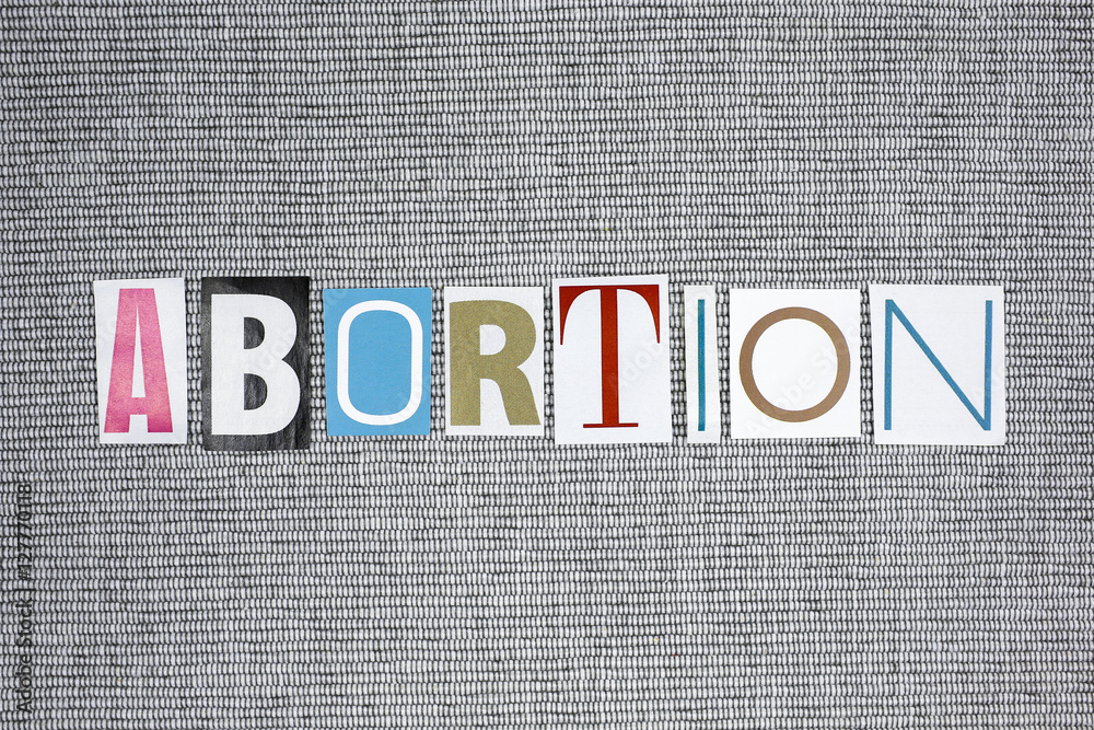 abortion word on grey background Stock Photo | Adobe Stock