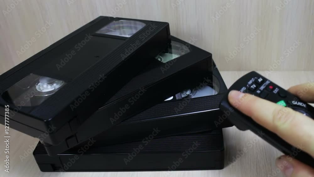 stack of VHS video tape cassette and popron Stock Video | Adobe Stock