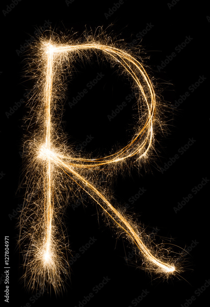 English Letter R from sparklers alphabet on black background. Stock ...