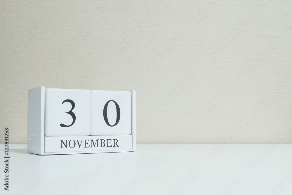Closeup white wooden calendar with black 30 november word on blurred ...