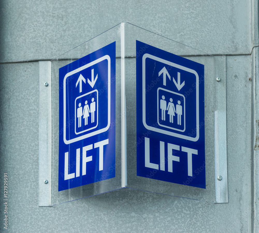 Elevator lift sign in a office building Stock Photo | Adobe Stock