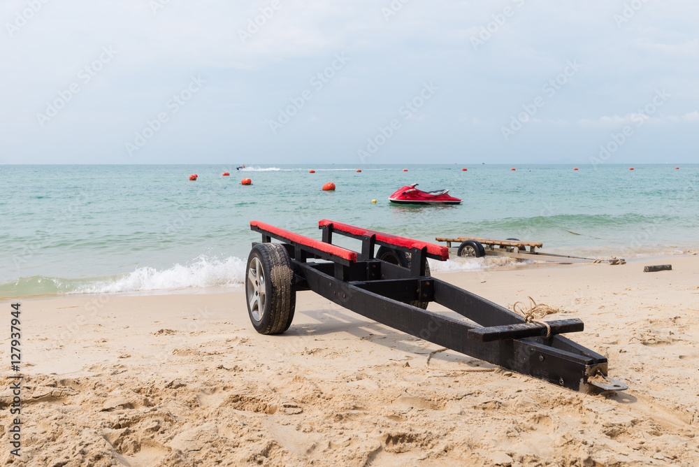 Empty trailer, rickshaw park at beach for transport boat from sea to ...