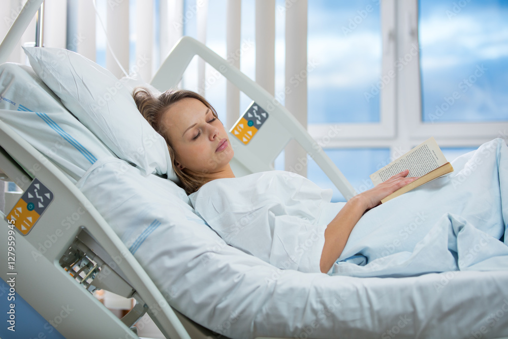 Pretty, young, female patient in a modern hospital room Stock Photo ...
