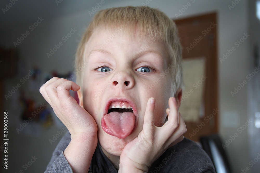 Funnt Bratty Kid Sticking Out His Tongue Stock Photo | Adobe Stock